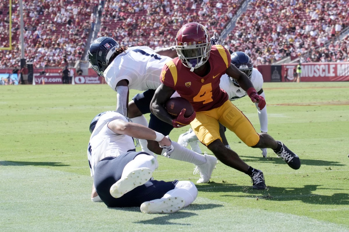 Photos: USC football explodes for 66-14 win over Rice in first game ...