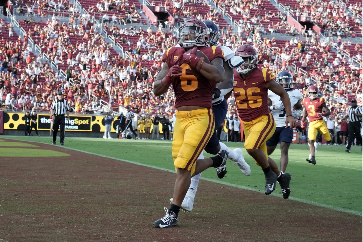 Photos: USC football explodes for 66-14 win over Rice in first game ...