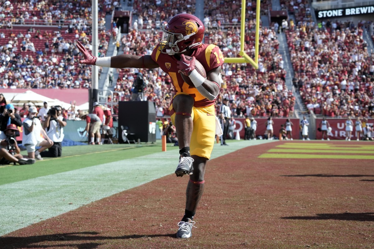 Photos: USC football explodes for 66-14 win over Rice in first game ...