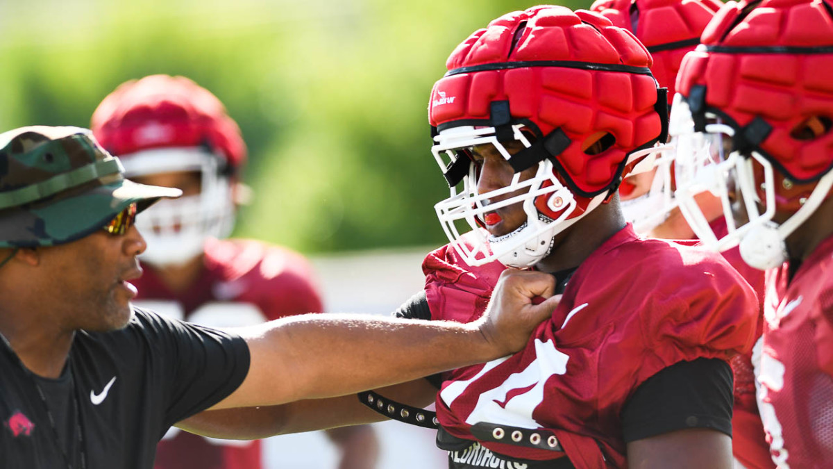 Razorbacks running back Dominique Johnson practices without green ...