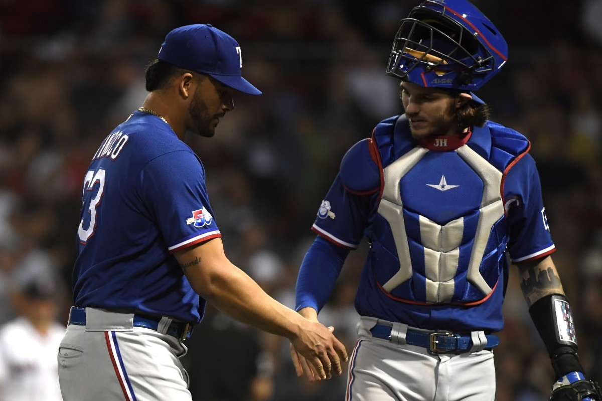 WATCH: Rangers Jonah Heim Makes Spectacular Catch Off Catcher's Mask ...