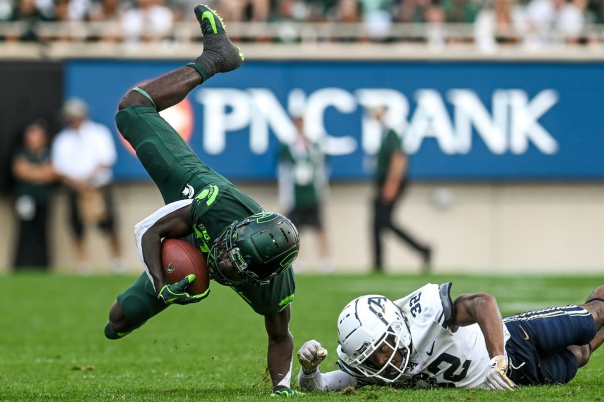 Michigan State football's Jayden Reed, Jacob Slade 'Out' vs. Washington, did not travel with ...