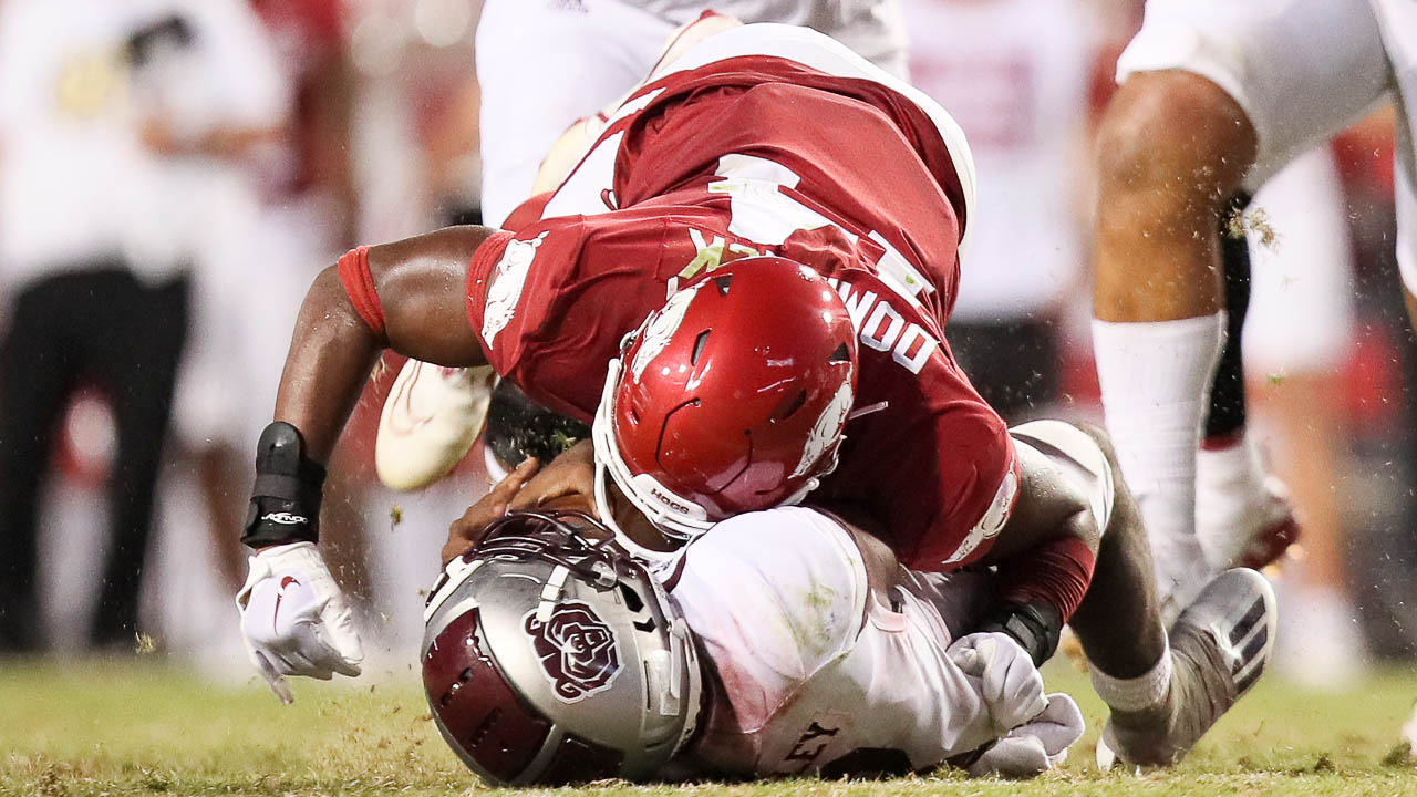 Hogs' Domineck Jordan, Drew Sanders, Simeon Blair - Sports Illustrated ...
