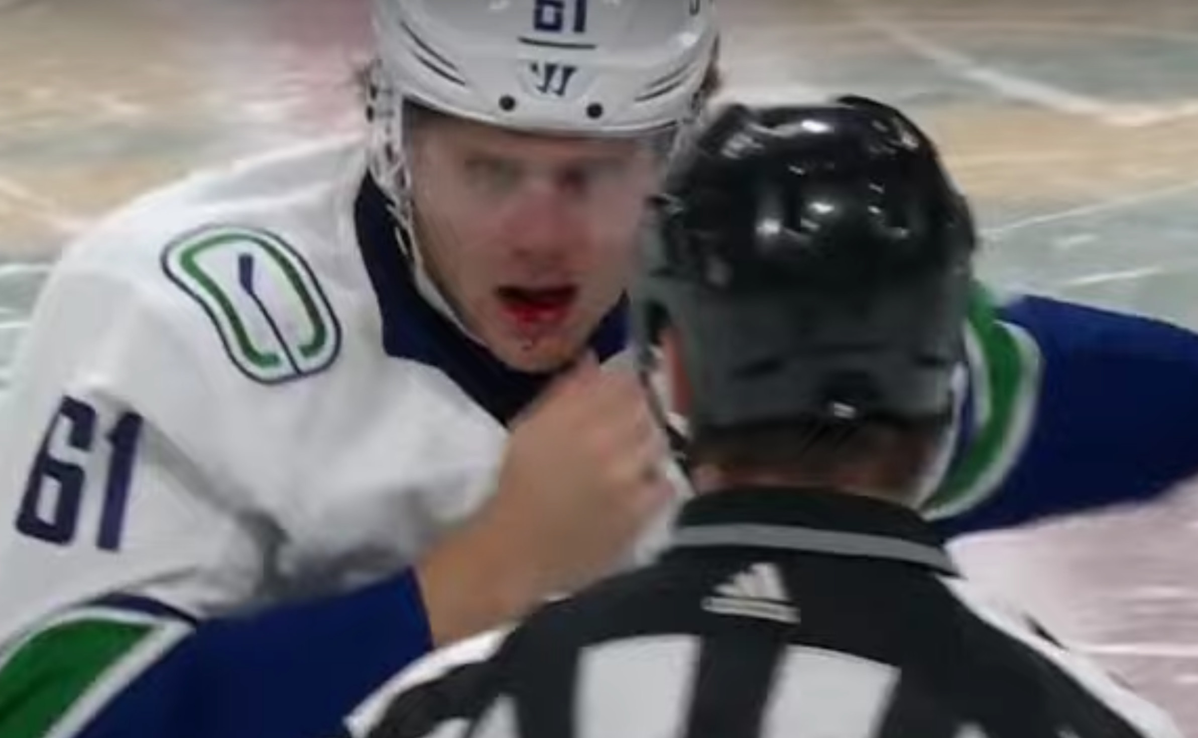 Wild's Brandon Duhaime bloodies Vancouver's Riley Stillman in fight ...