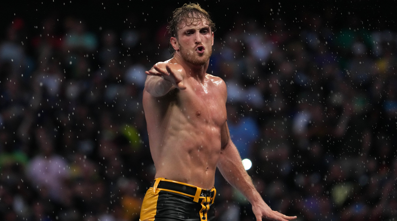Logan Paul Films Himself Jumping Through Table At Wwe Crown Jewel