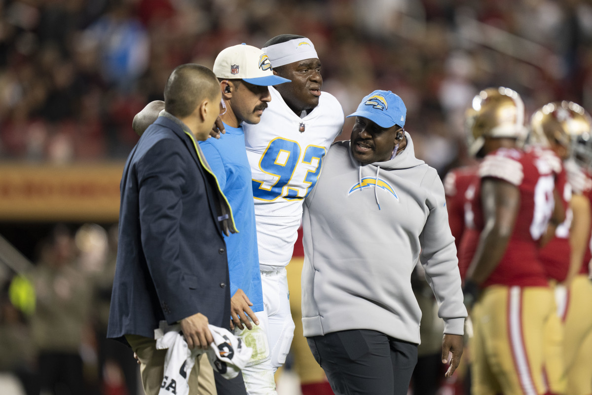 Los Angeles Chargers Place DL Otito Ogbonnia and DL Christian Covington ...