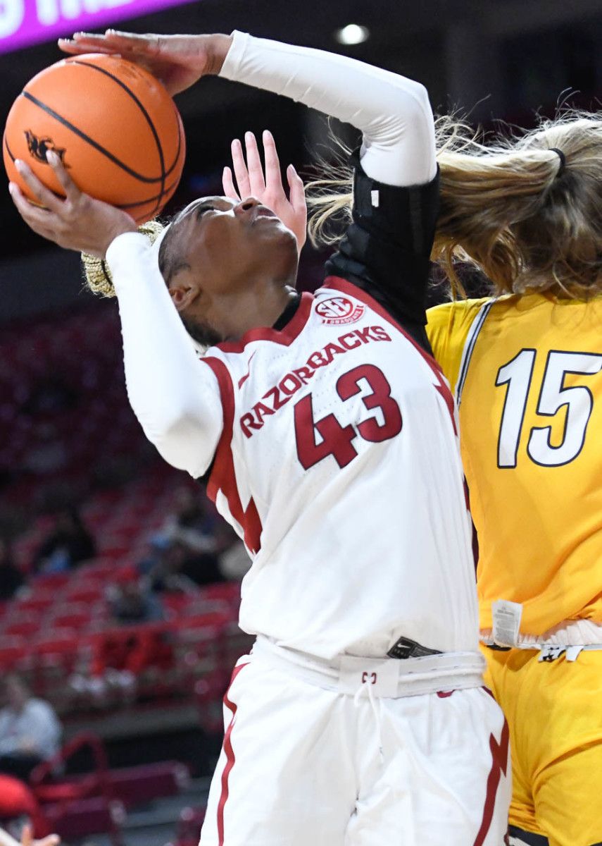 Hogs coach Mike Neighbors picks up 100th win, downing Kent State ...