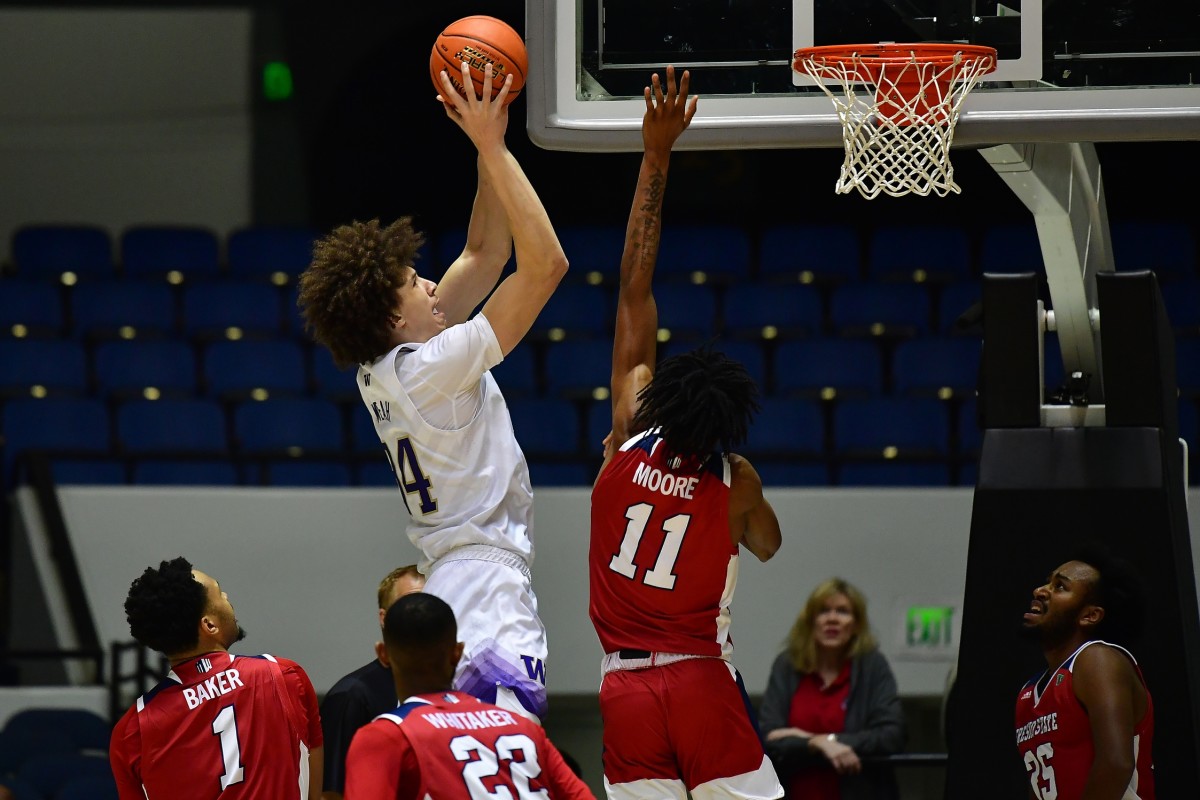 Huskies Survive Shaky Start and Finish to Win Wooden Opener - Sports ...