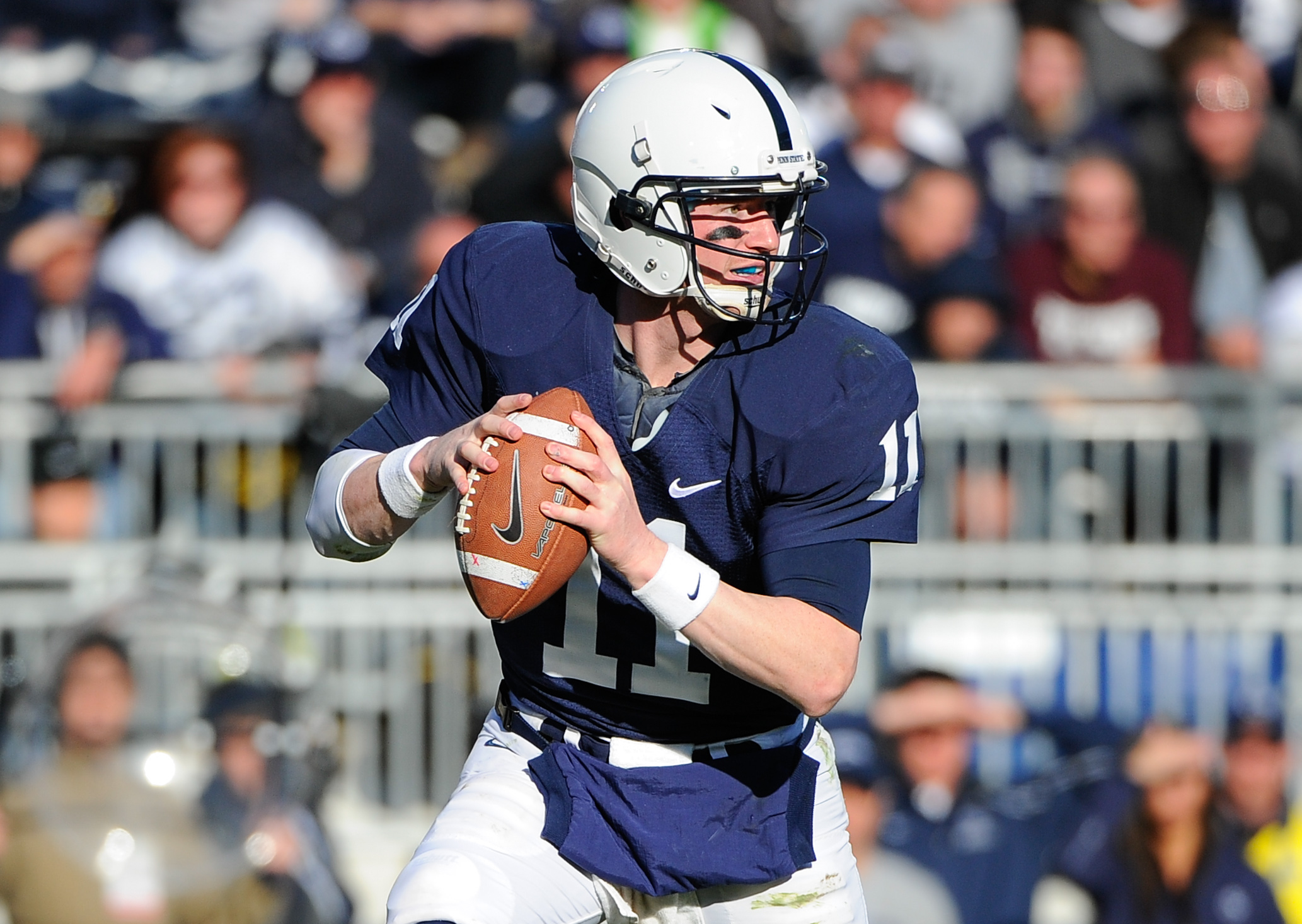 Penn State Quarterback Matt McGloin runs for Penn State's Board of ...