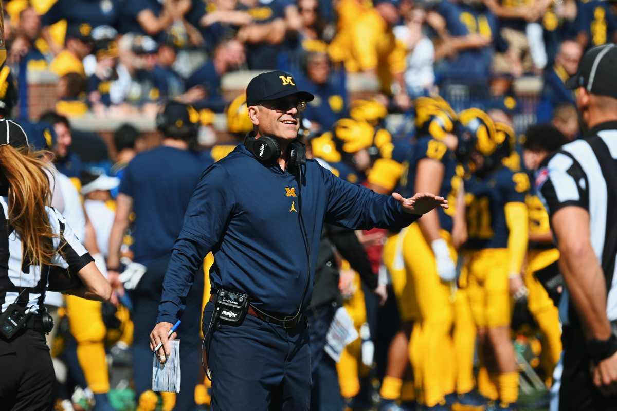 Charlotte head coach Biff Poggi defends Michigan football and Jim ...