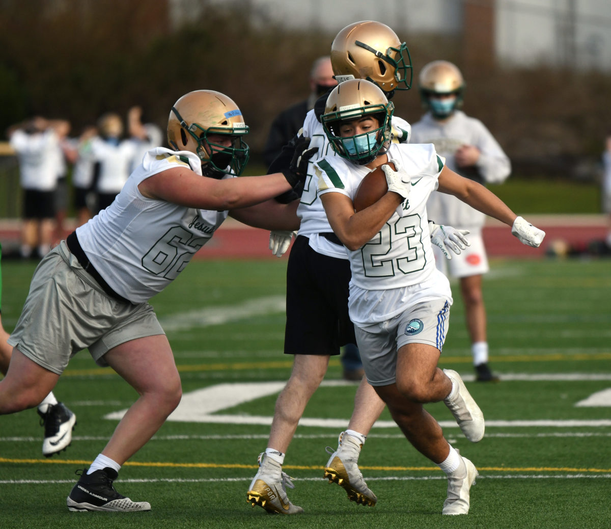 PHOTOS: Jesuit Crusaders prepare for 2021 spring football season ...