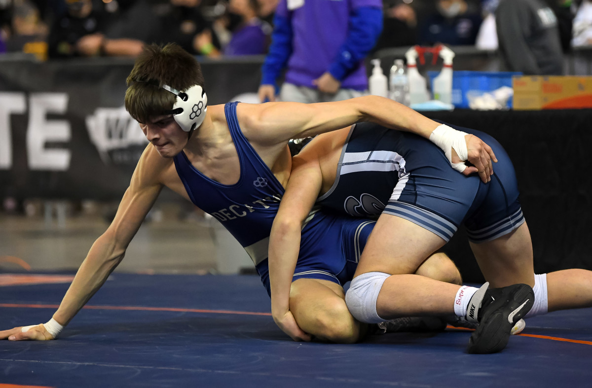 Photos: End-of-day grind as some wrestlers advance to Mat Classic ...