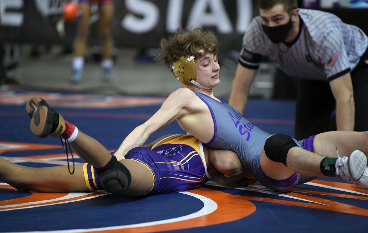 Photos: End-of-day grind as some wrestlers advance to Mat Classic ...