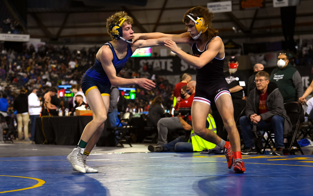 Photos: End-of-day grind as some wrestlers advance to Mat Classic ...