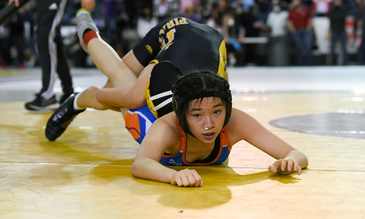 Photos: End-of-day grind as some wrestlers advance to Mat Classic ...