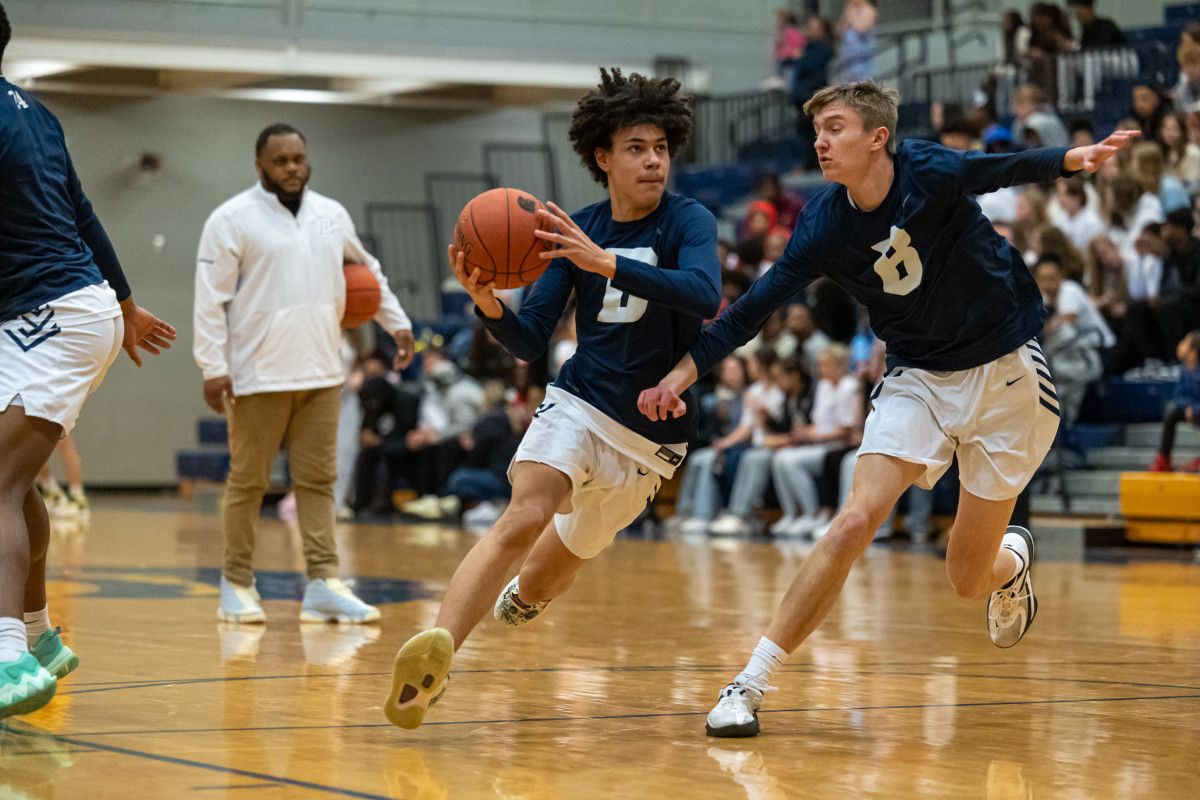 Photos: Battle boys basketball team earns first win over rival Rock ...