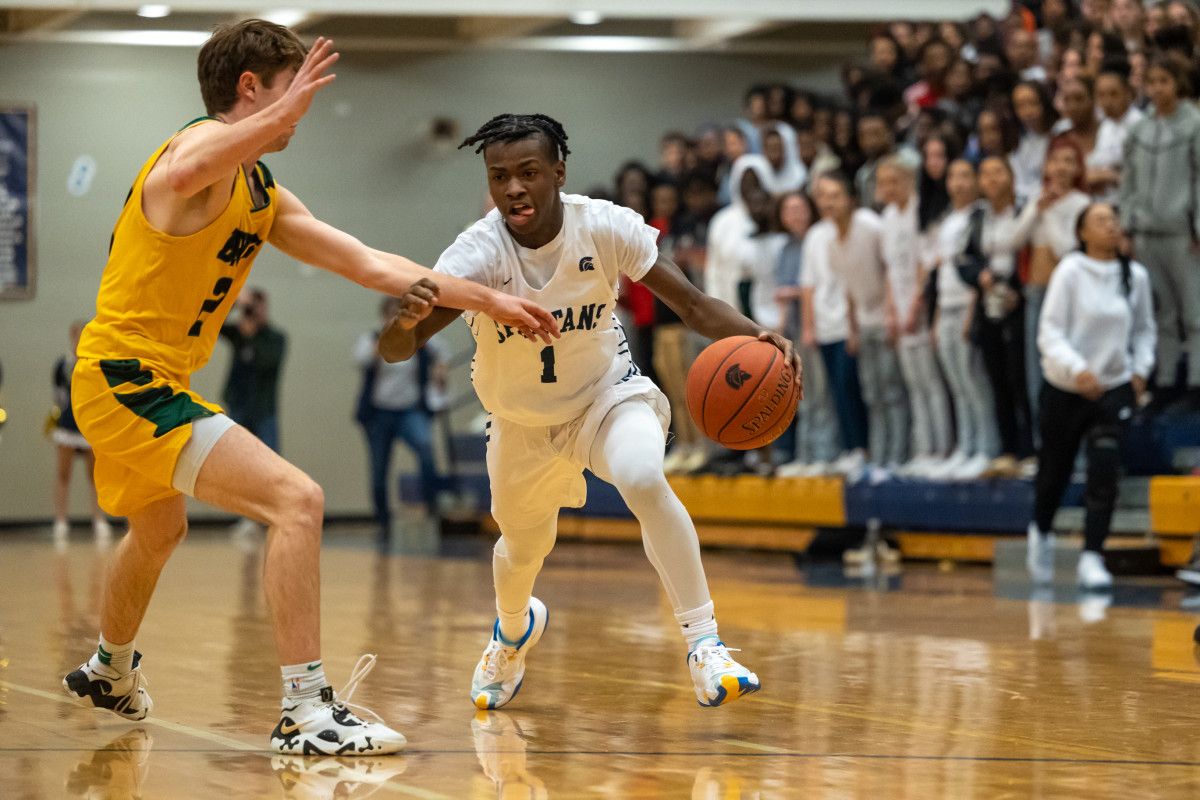 Photos: Battle boys basketball team earns first win over rival Rock ...