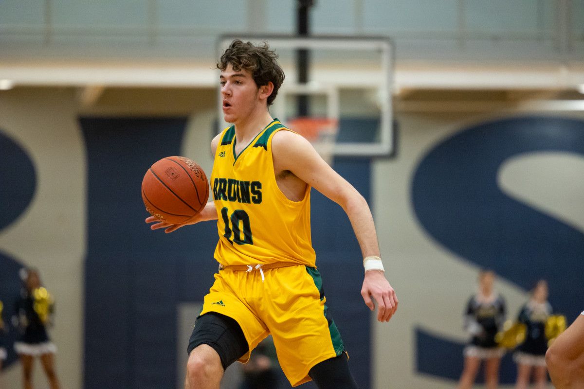 Photos: Battle boys basketball team earns first win over rival Rock ...