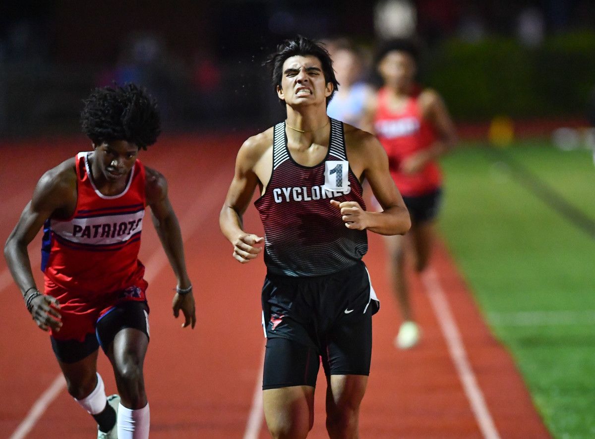 Russellville girl, boy runners steal show on home track at Meet of ...