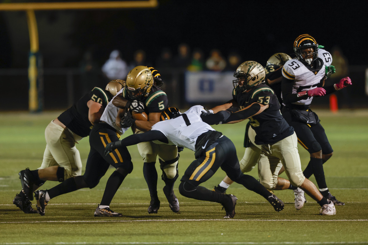 St. Vincent-St. Mary football runs to 49-21 win over Cleveland Heights ...