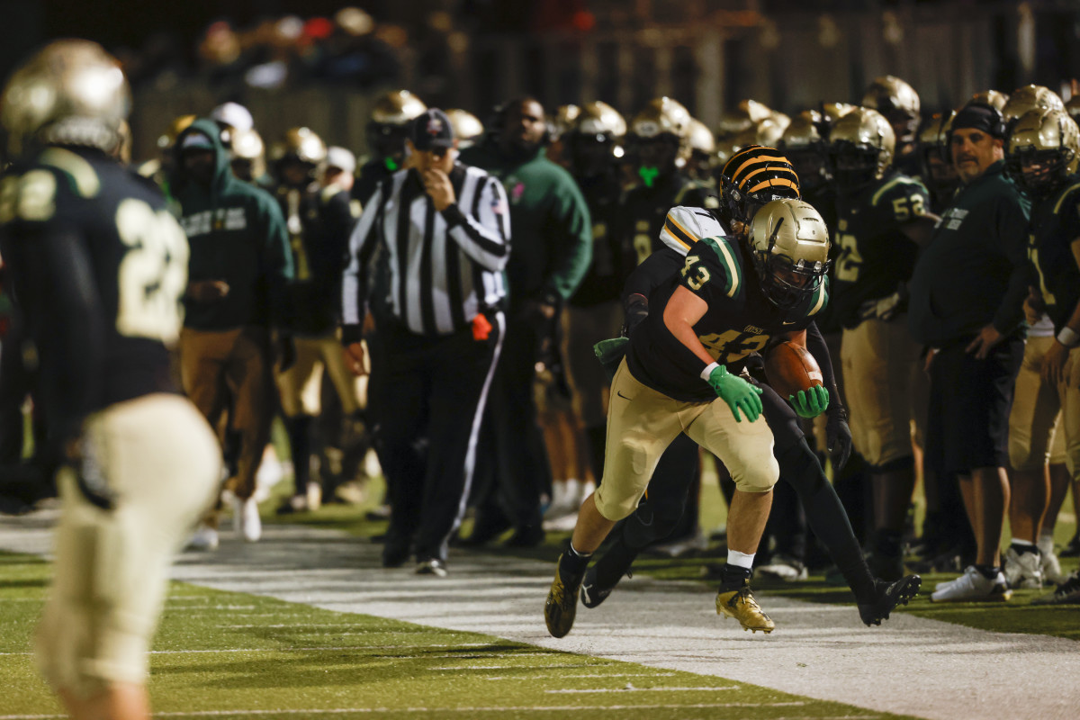 St. Vincent-St. Mary football runs to 49-21 win over Cleveland Heights ...