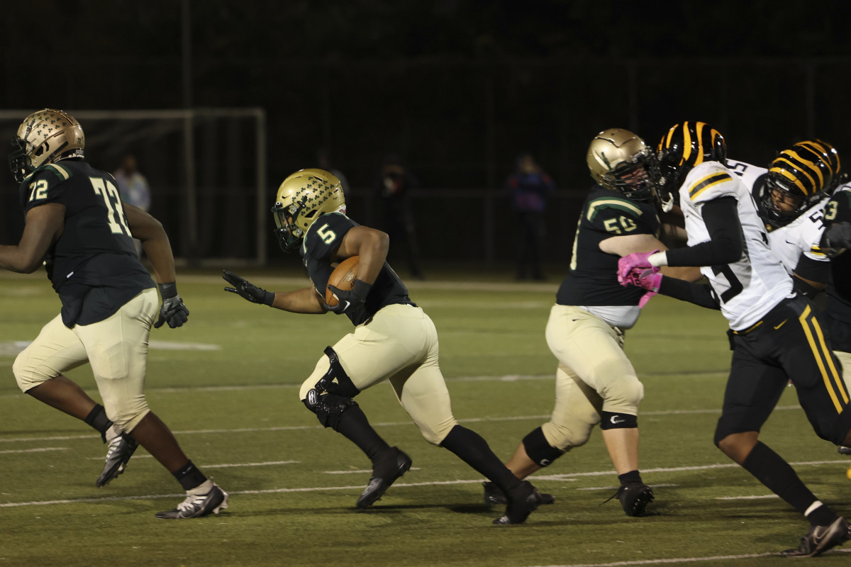 St. Vincent-St. Mary football runs to 49-21 win over Cleveland Heights ...