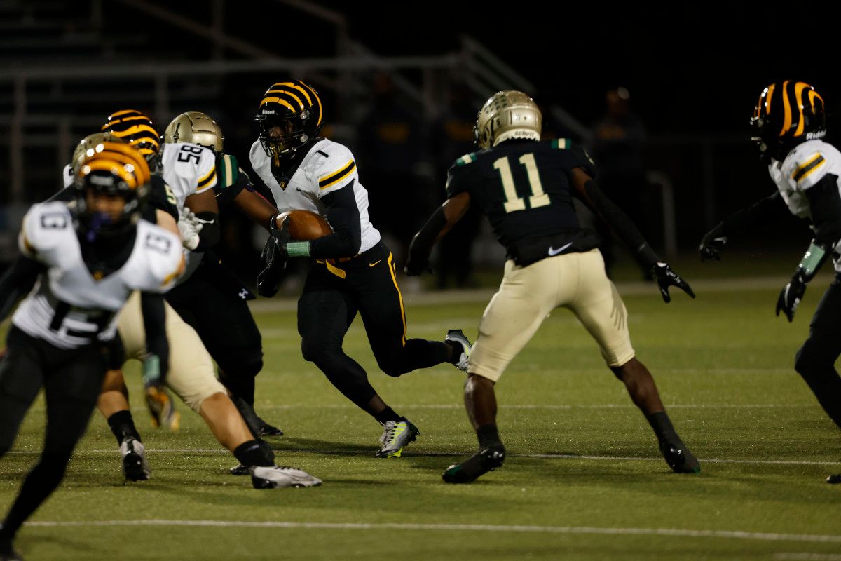 St. Vincent-St. Mary football runs to 49-21 win over Cleveland Heights ...