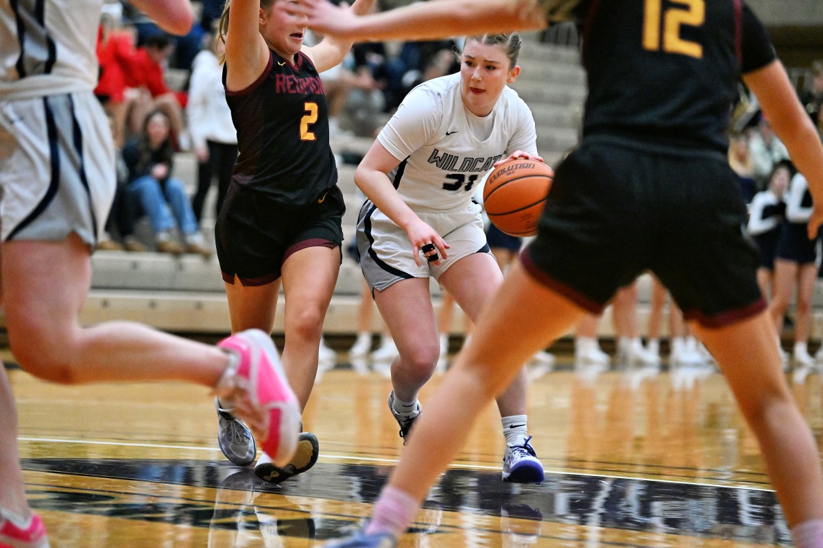 Redmond outlasts Wilsonville in OT for historic win, 5A girls semifinal date with Silverton ...