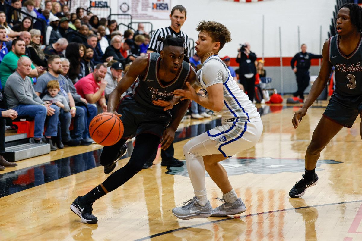 Bradley Longcor III, KeShaun Thomas lead Quincy past Cardinal Ritter in ...